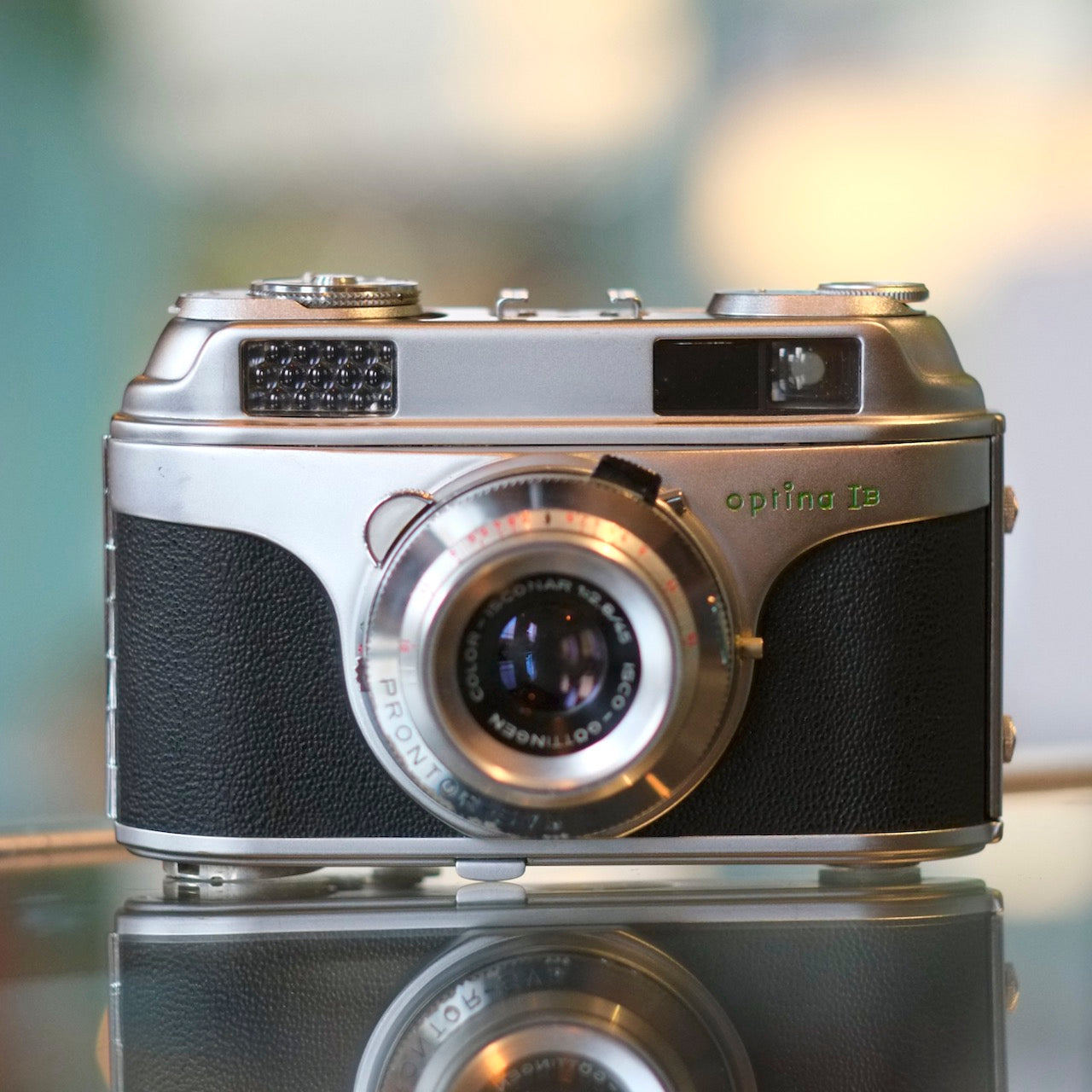 Optina Ib – Camera Traders